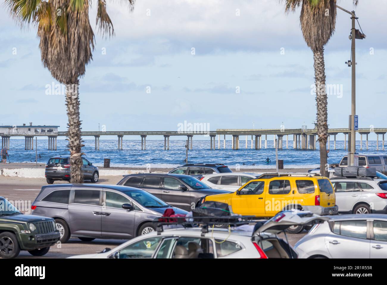 The parking lot at Dog Beach with a view of the Ocean Beach Pier. San ...