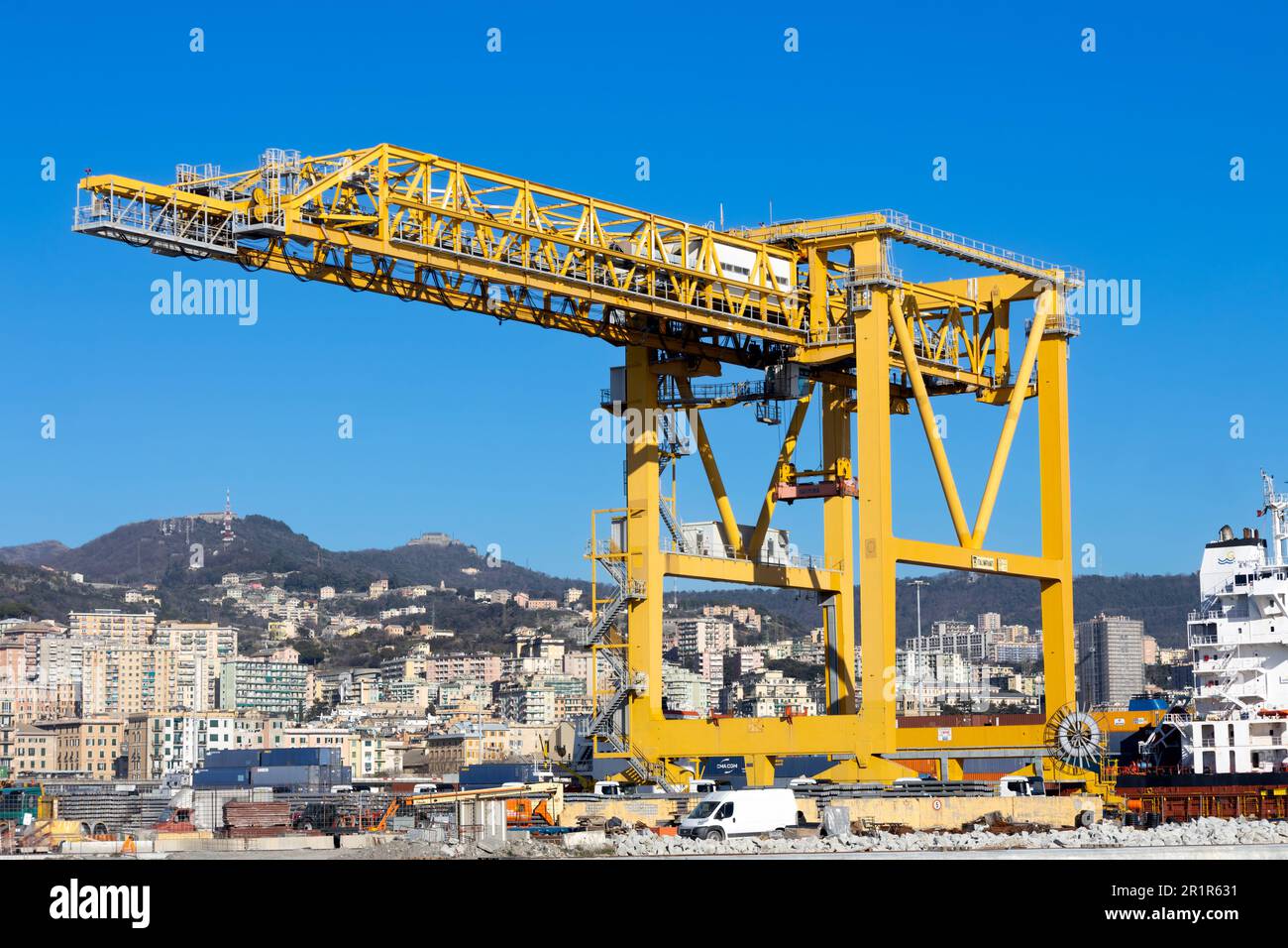 GENOA, ITALY, FEBRUARY 2, 2023 - Industrial crane yellow color in the ...