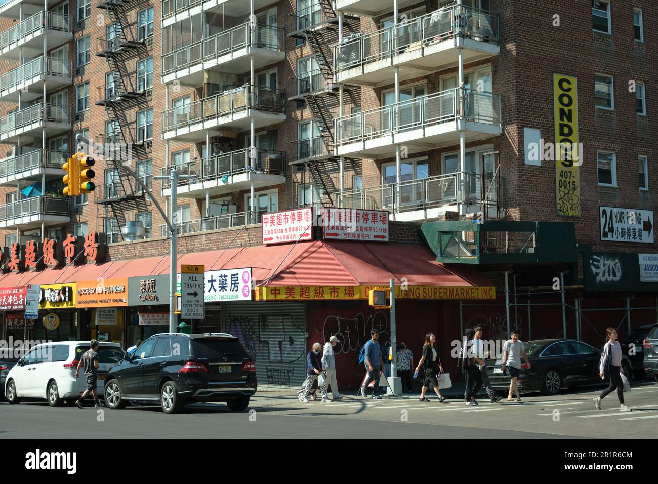 Street scene with vibrant signs, Flushing, Queens, New York Stock Photo ...