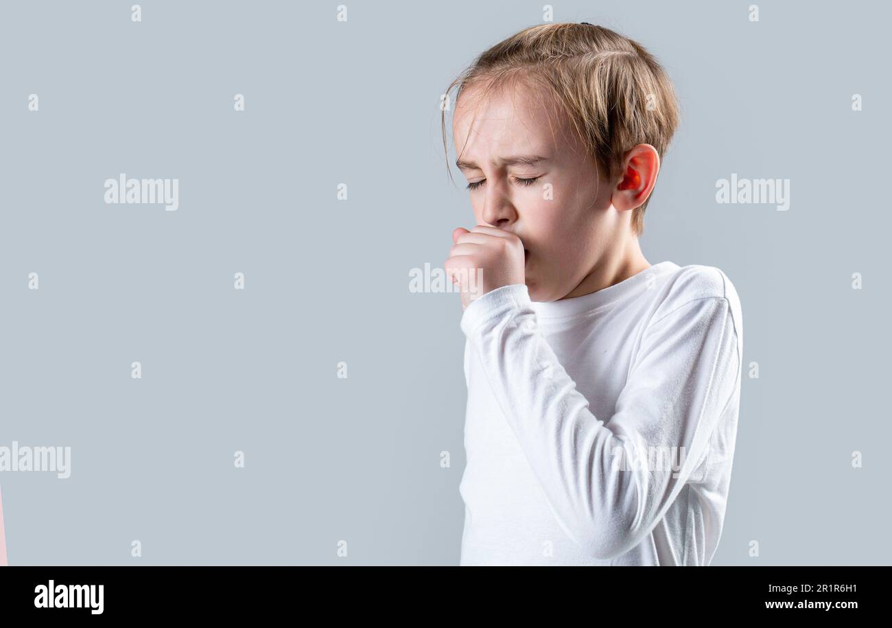 Boy coughing sick colds sneezing cough. Child got sick with a virus ...