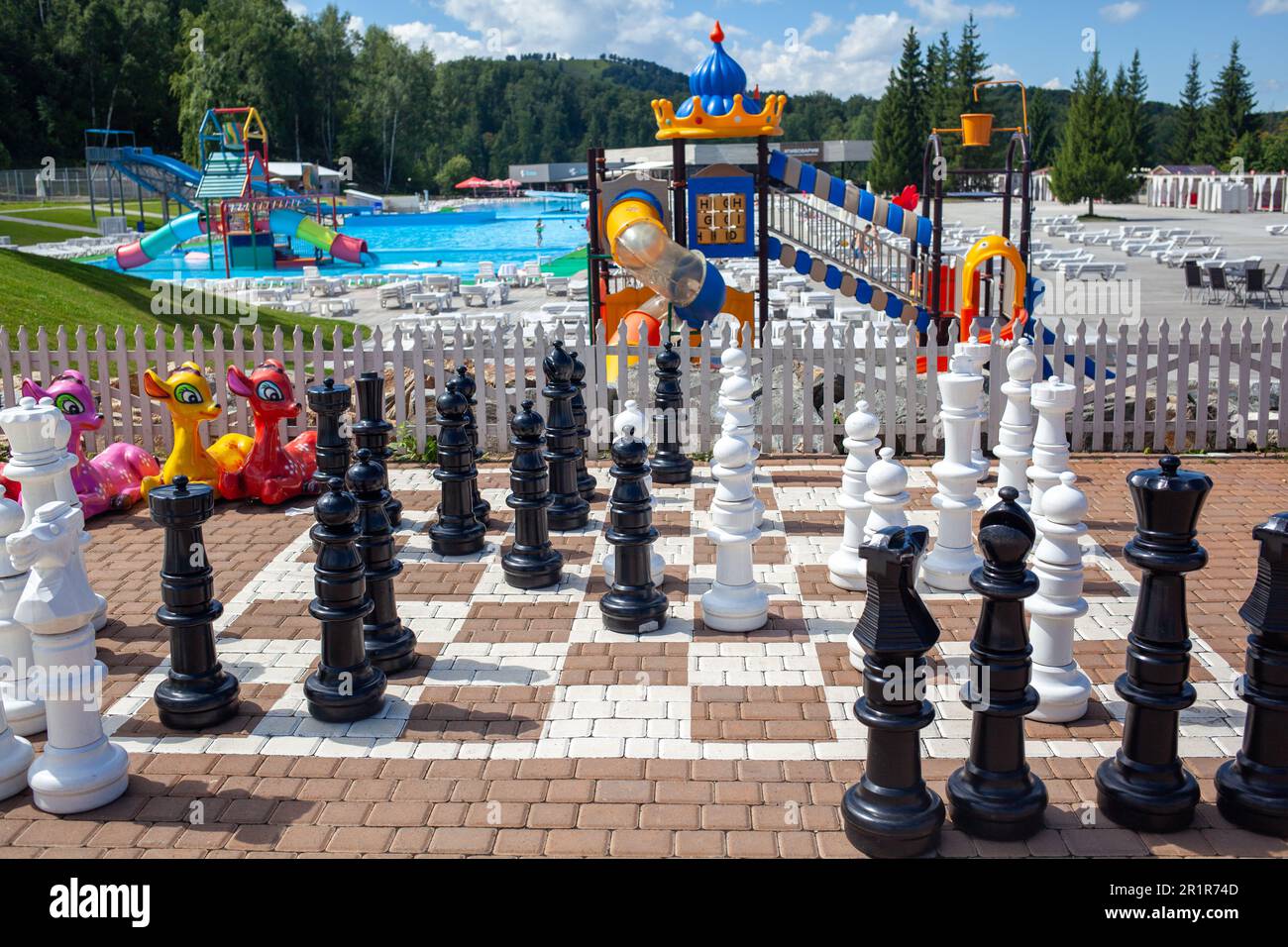 Close up big pieces and giant chess board of street chess in the park ...