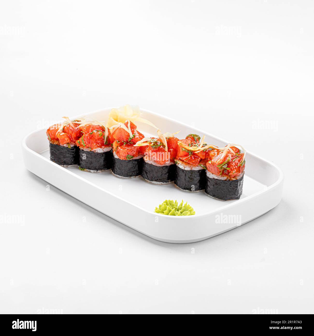 Portion of japanese sushi rolls with spicy tuna fish Stock Photo - Alamy