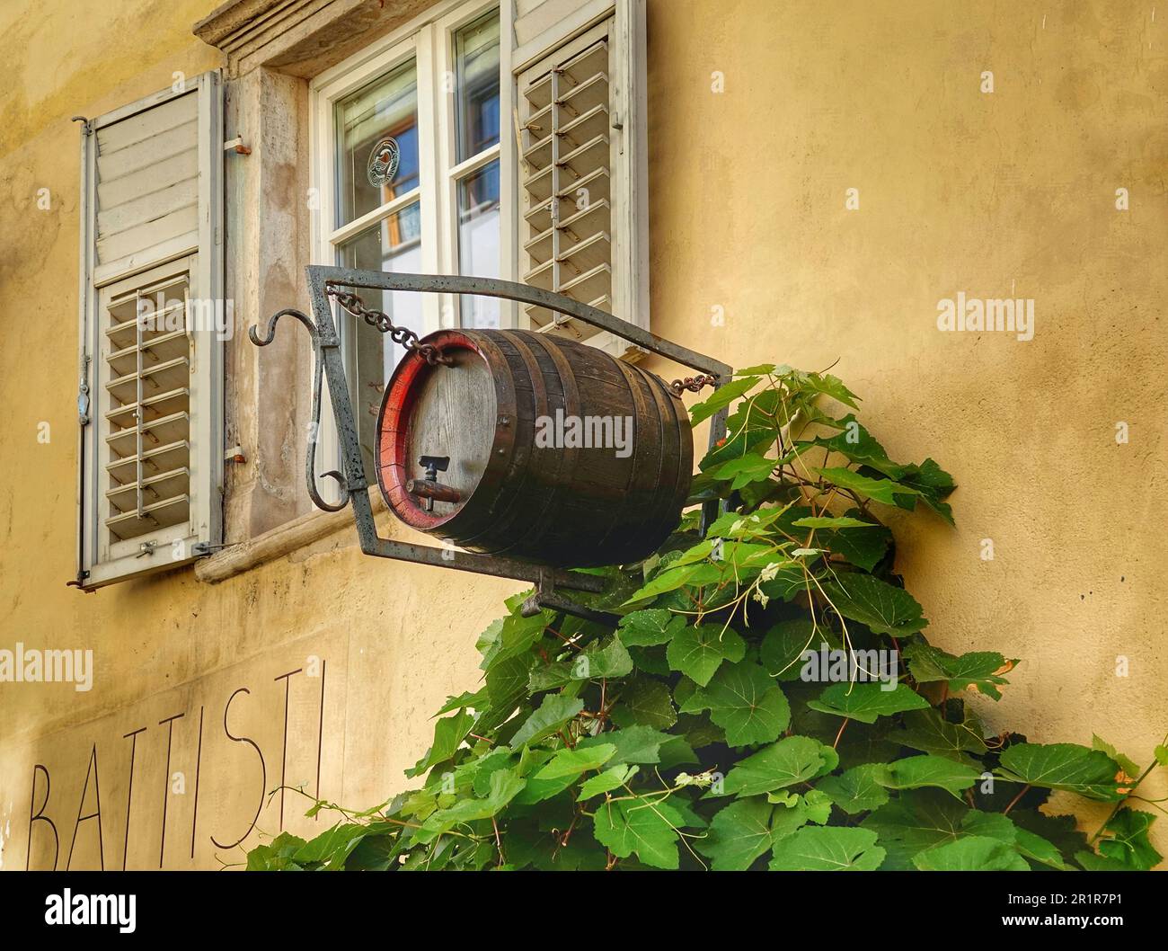 A wooden wine barrel affixed to the wall of a vinotheque in the town of ...