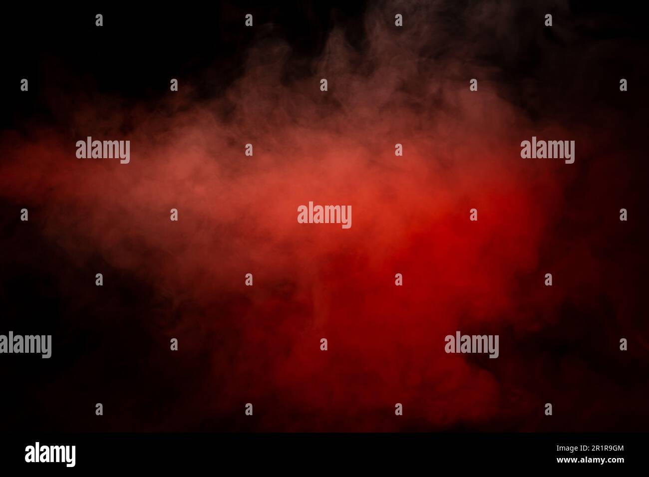 Orange and red steam on a black background. Copy space Stock Photo - Alamy
