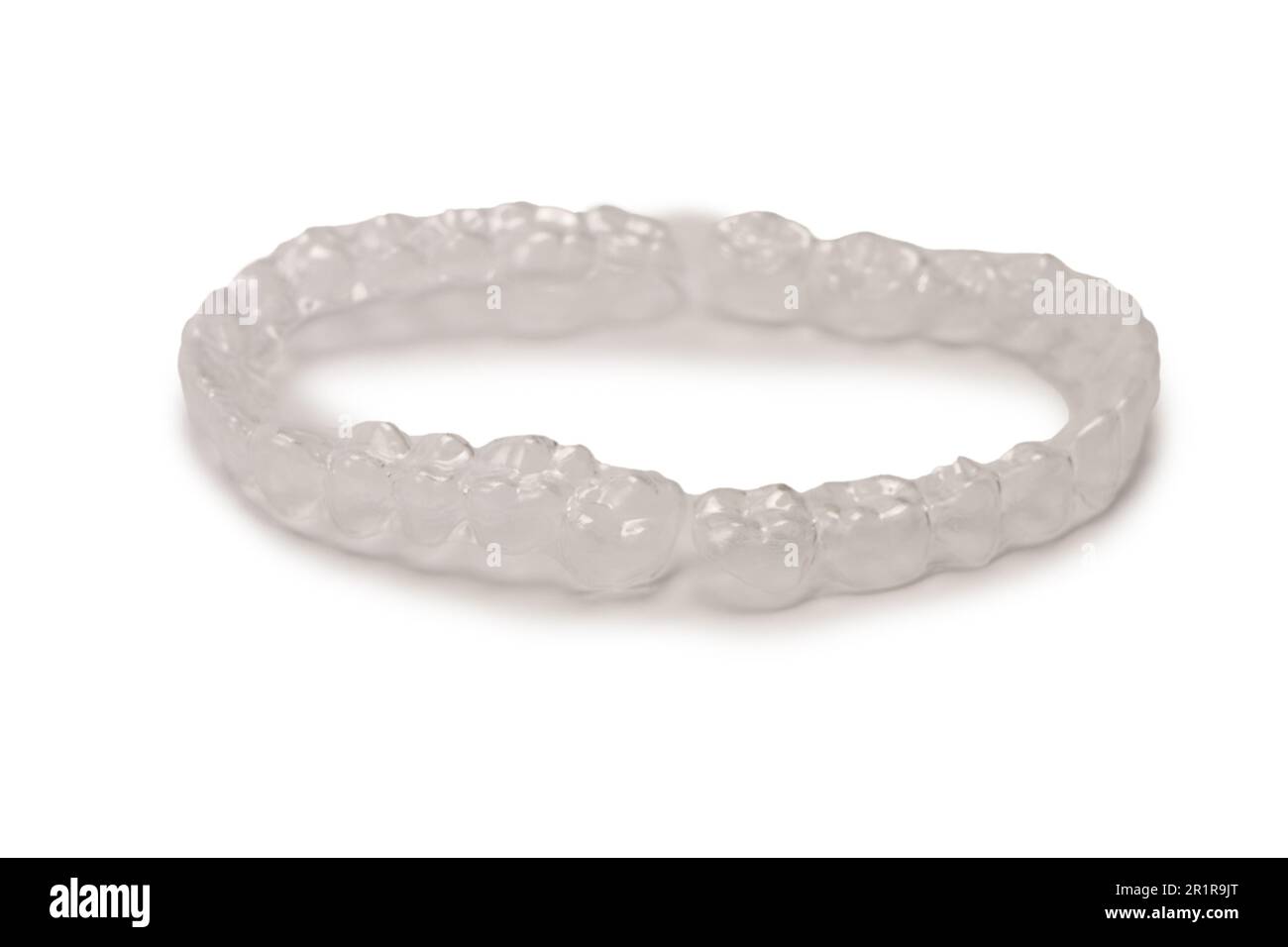 Transparent mouth guard isolated on a white background Stock Photo - Alamy