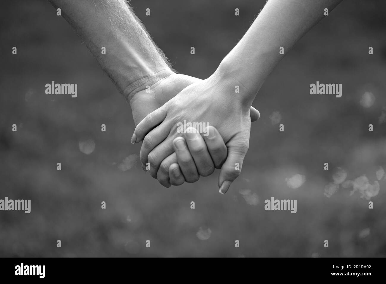 Hold on, hands, couples. Couple hold hand in the autumn or summer park ...