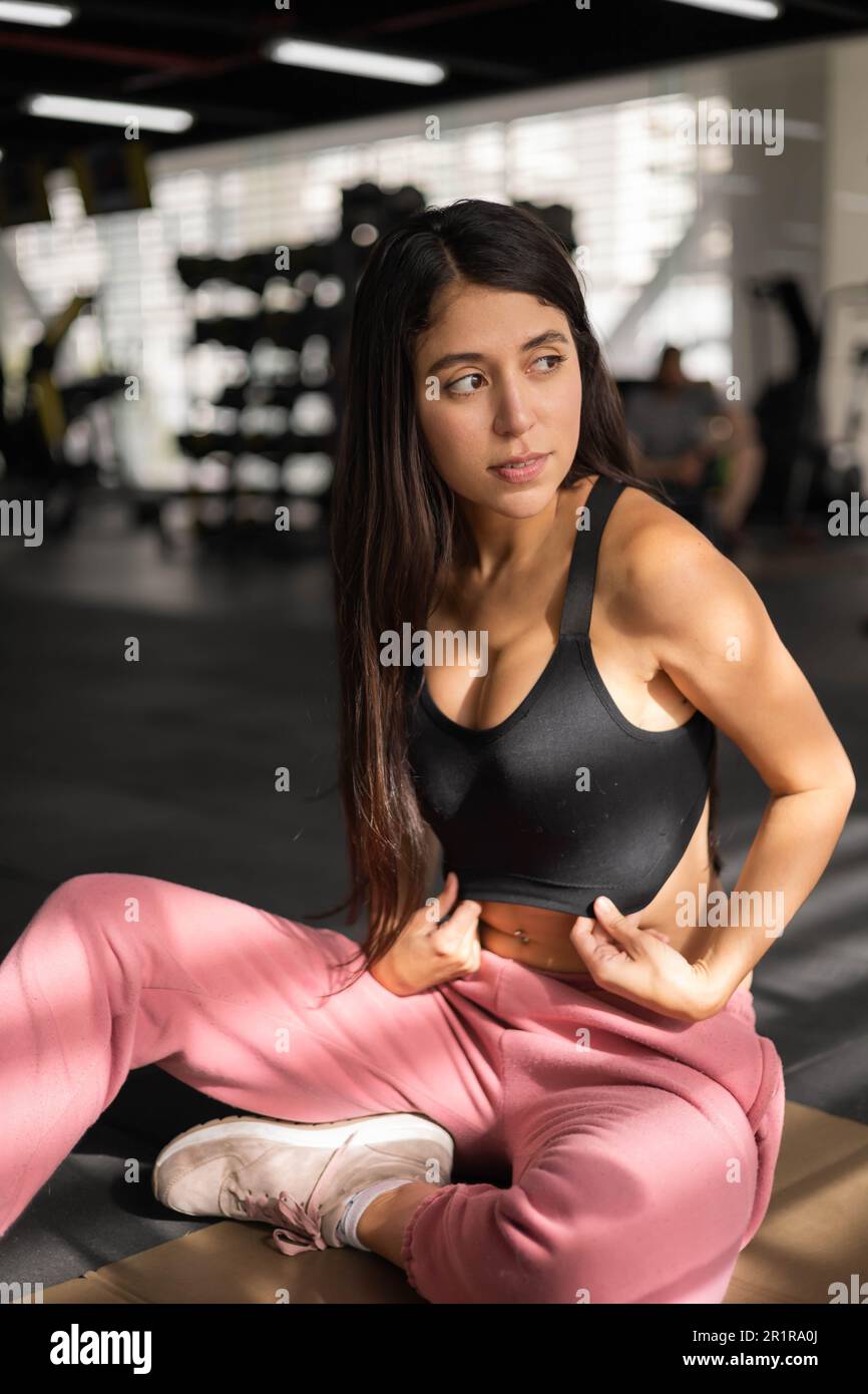 young woman with straight hair, healthy lifestyle and wear sportswear ...