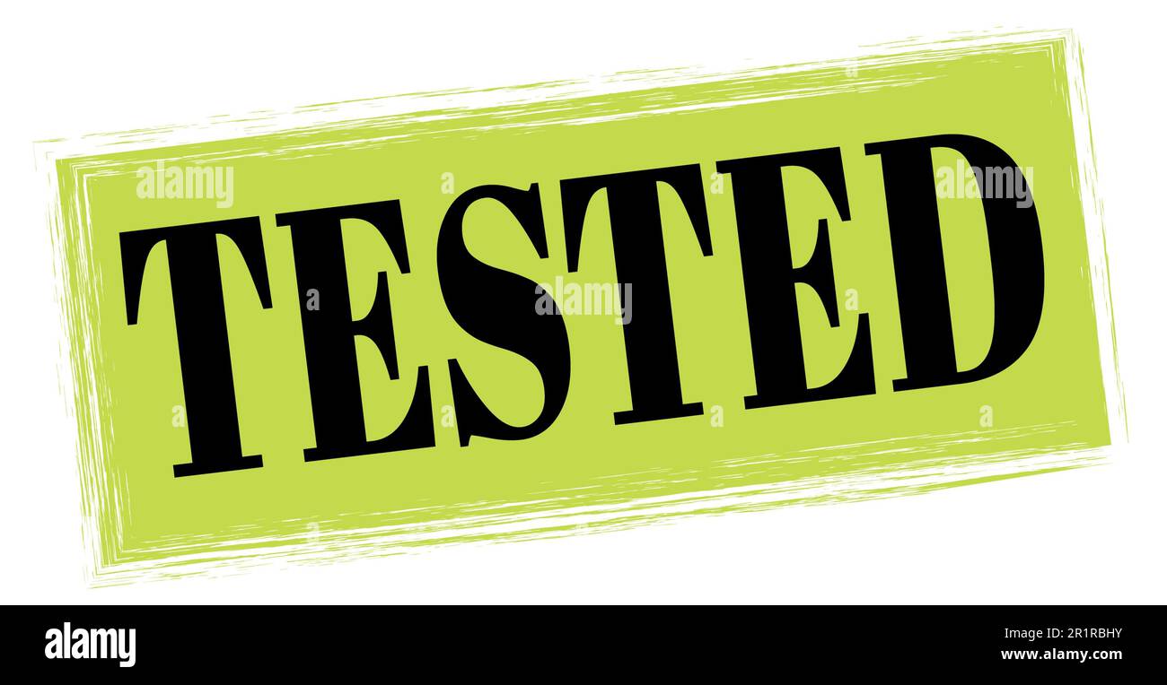 TESTED text written on green-black rectangle stamp sign Stock Photo - Alamy