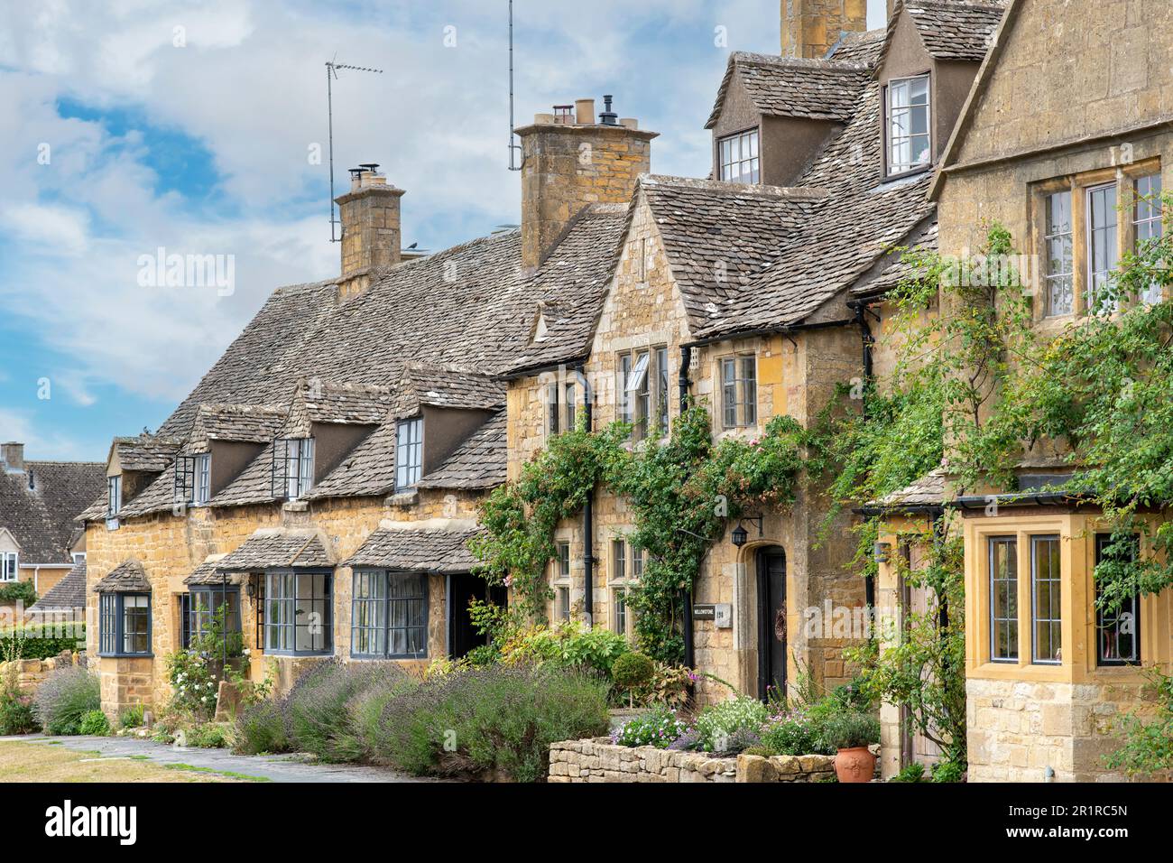 Broadway, UK-August 2022; View along High Street with typical Cotswolds ...