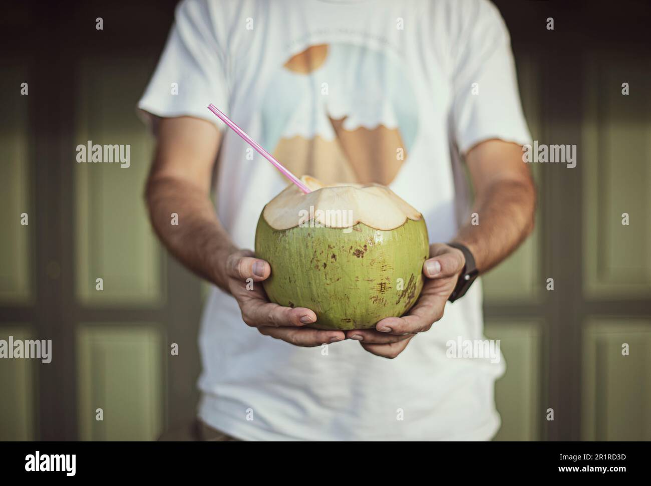 Fresh coconut straw standing on hi-res stock photography and images - Alamy