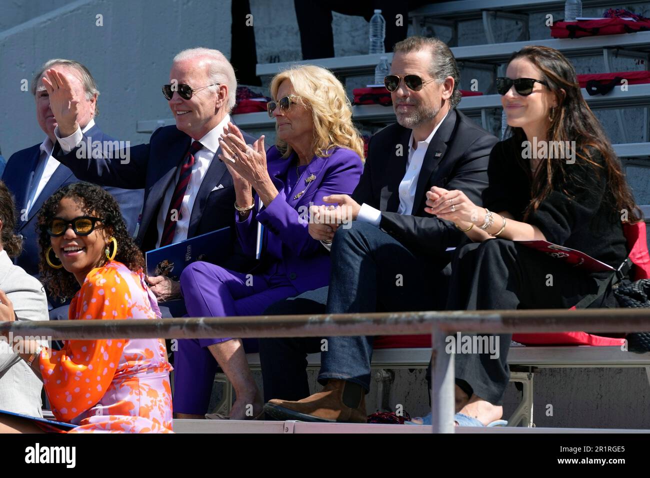 President Joe Biden waves as he arrives to attend his granddaughter ...