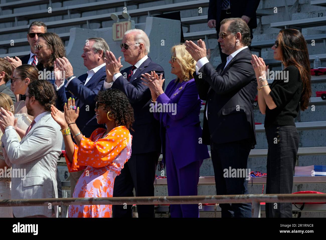 President Joe Biden stands with his family as he attends his ...
