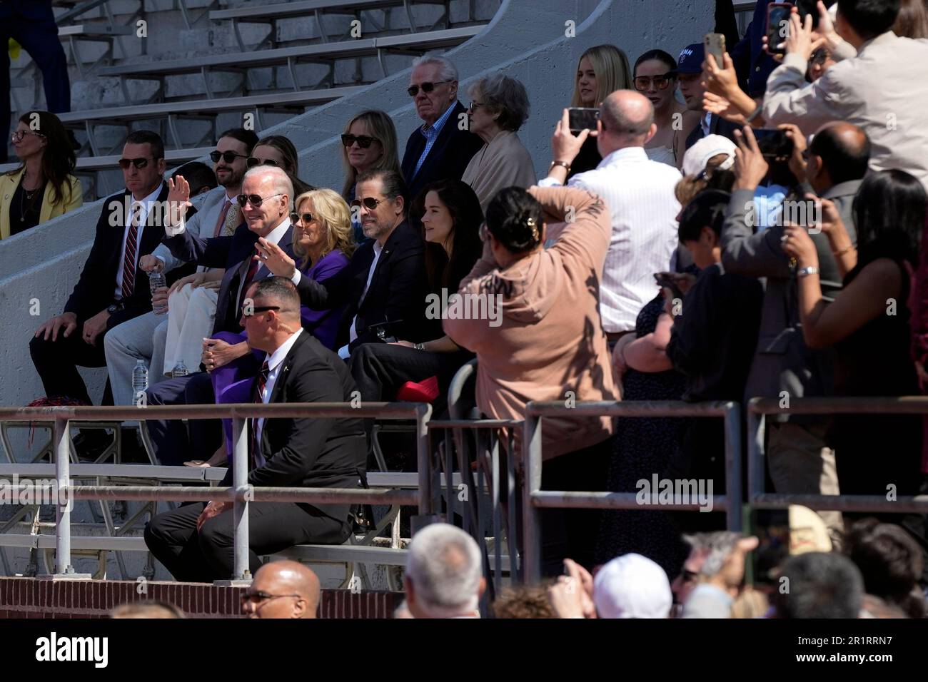 President Joe Biden waves as he attends his granddaughter Maisy Biden's ...
