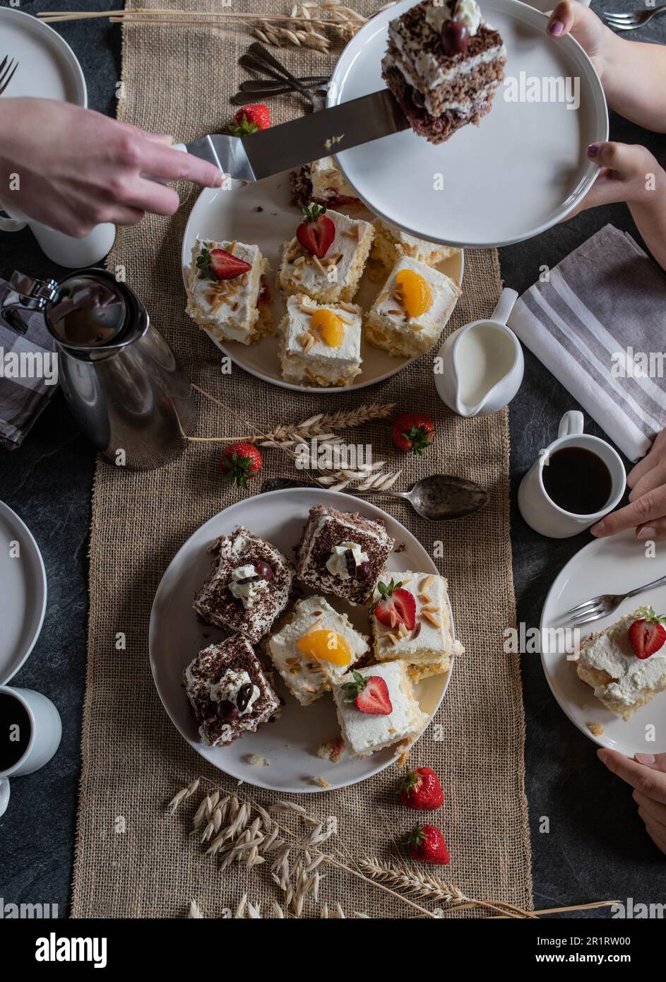 Coffee and cake on a dinner table from above Stock Photo - Alamy
