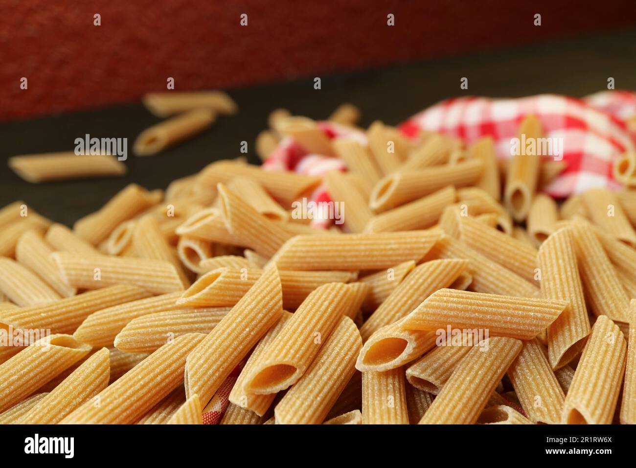 Pile of Uncooked Dried Whole Wheat Penne Rigate Pasta Stock Photo - Alamy
