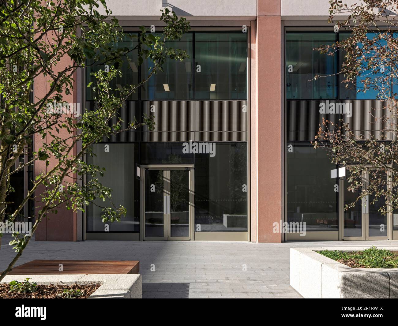 Side entrance to building complex. The Broadway, London, United Kingdom. Architect: Squire ...