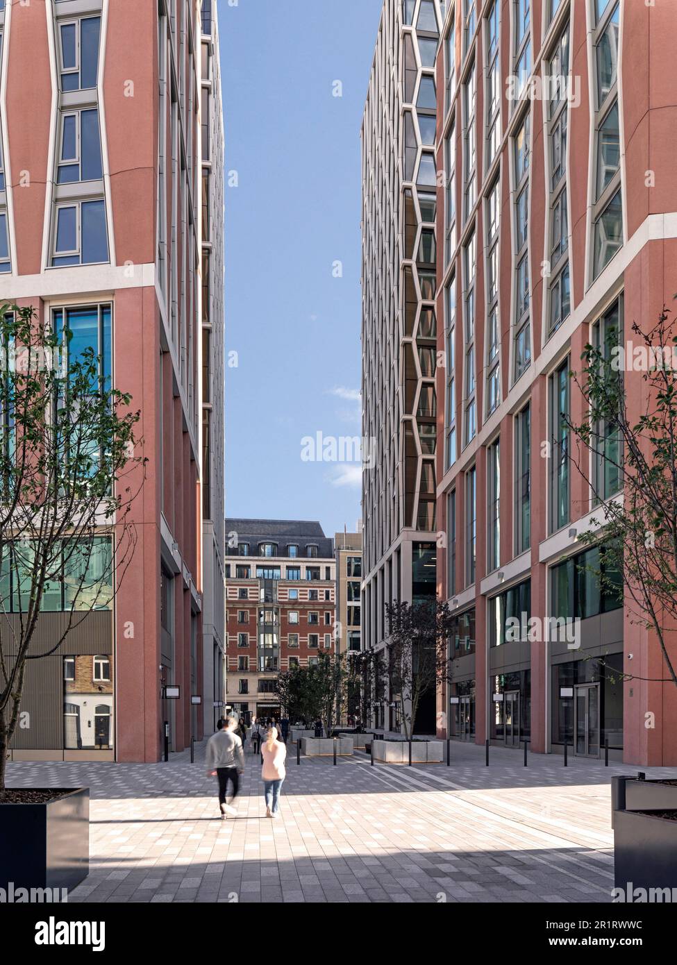 Pedestrianised passage between building complex. The Broadway, London ...