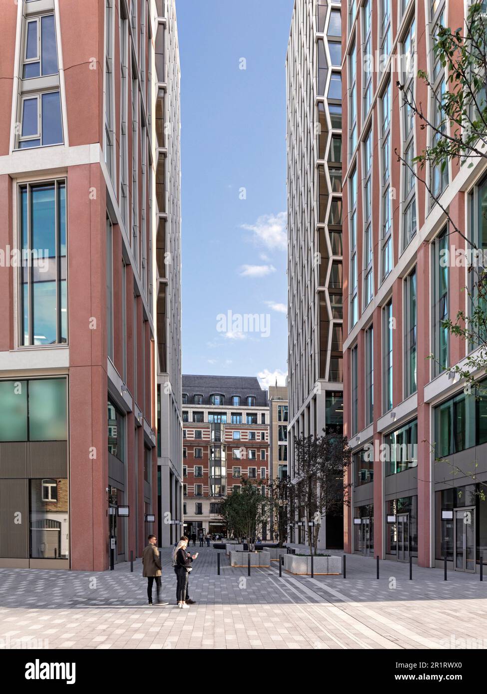 Pedestrianised passage between building complex. The Broadway, London ...