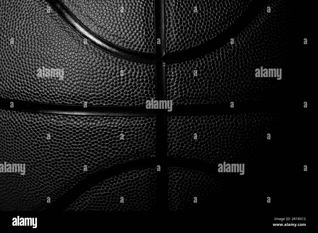 Closeup detail of black basketball ball texture background. Horizontal ...