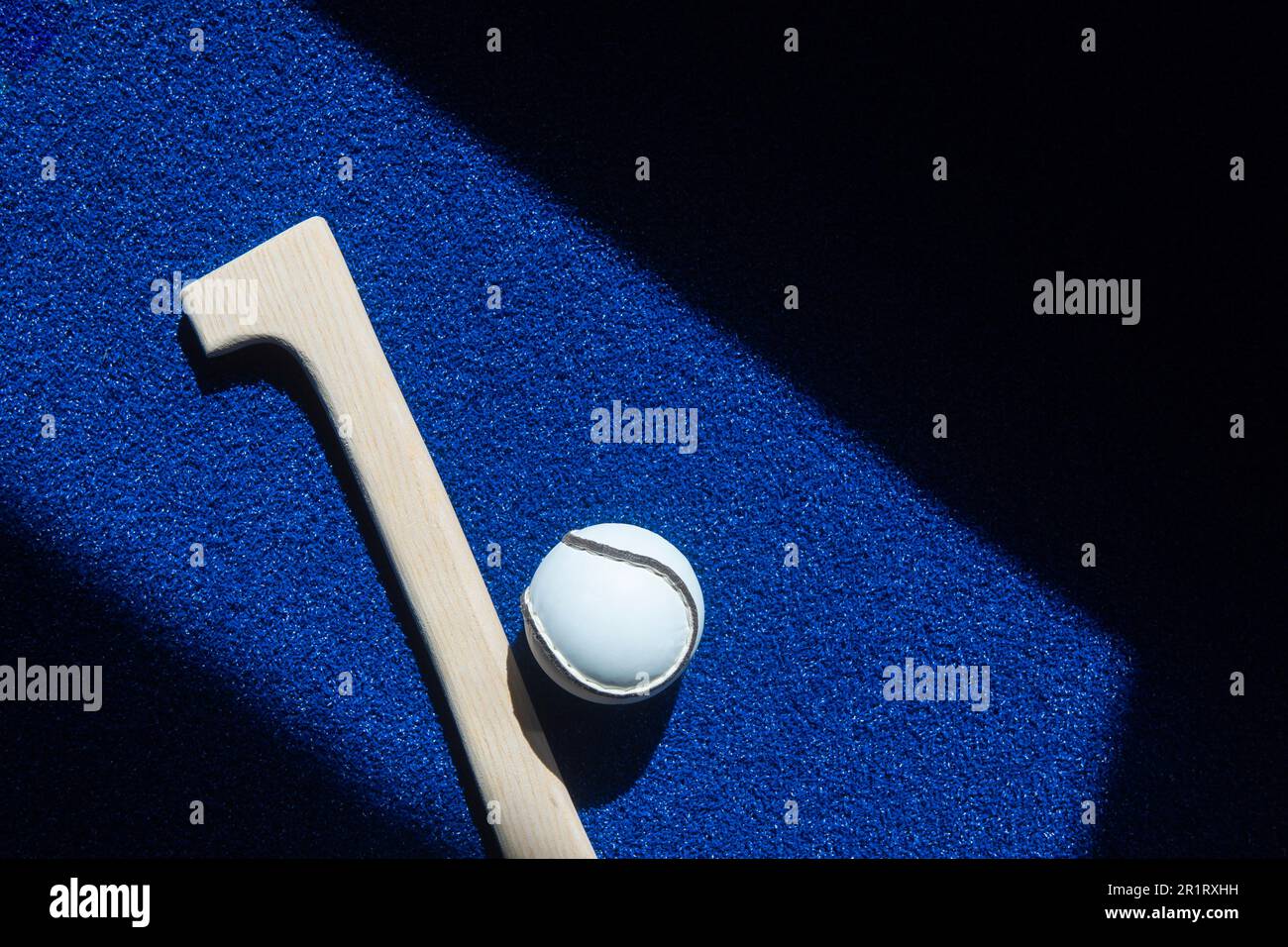 Hurling bat and sloitar on blue background. Horizontal sport theme ...