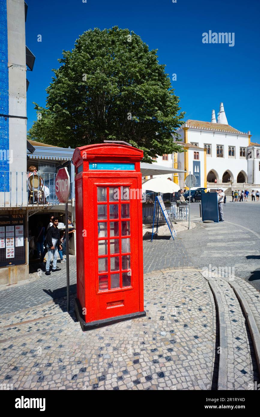 Red telephone kiosk with the Palace of Sintra in the background Stock ...