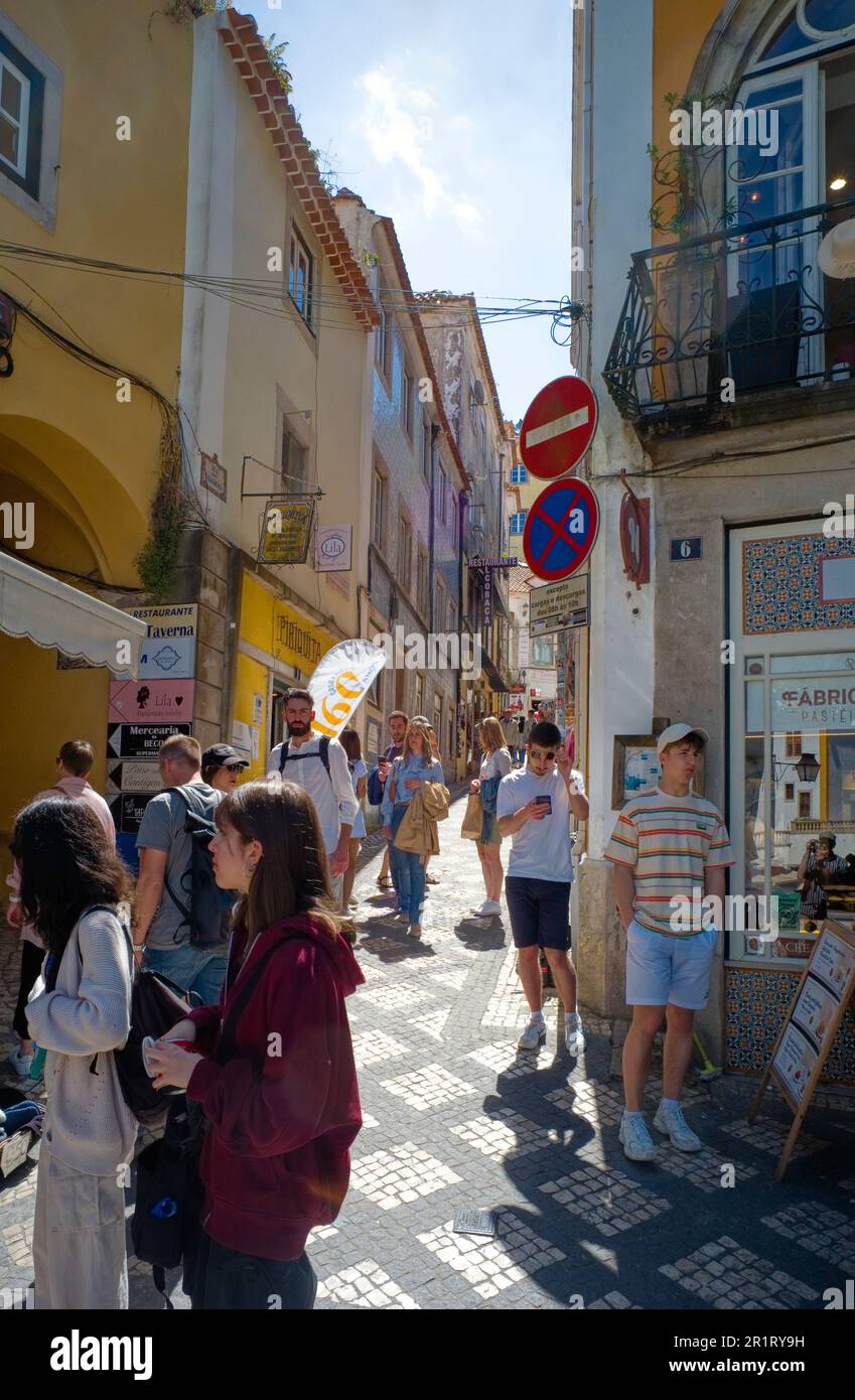 The narrow streets of Sintra are thronged with tourists during the day ...