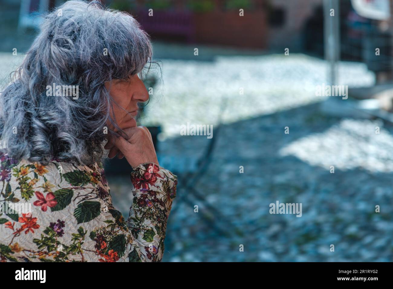 Displeased grey haired woman has discontent face expression. Old people ...