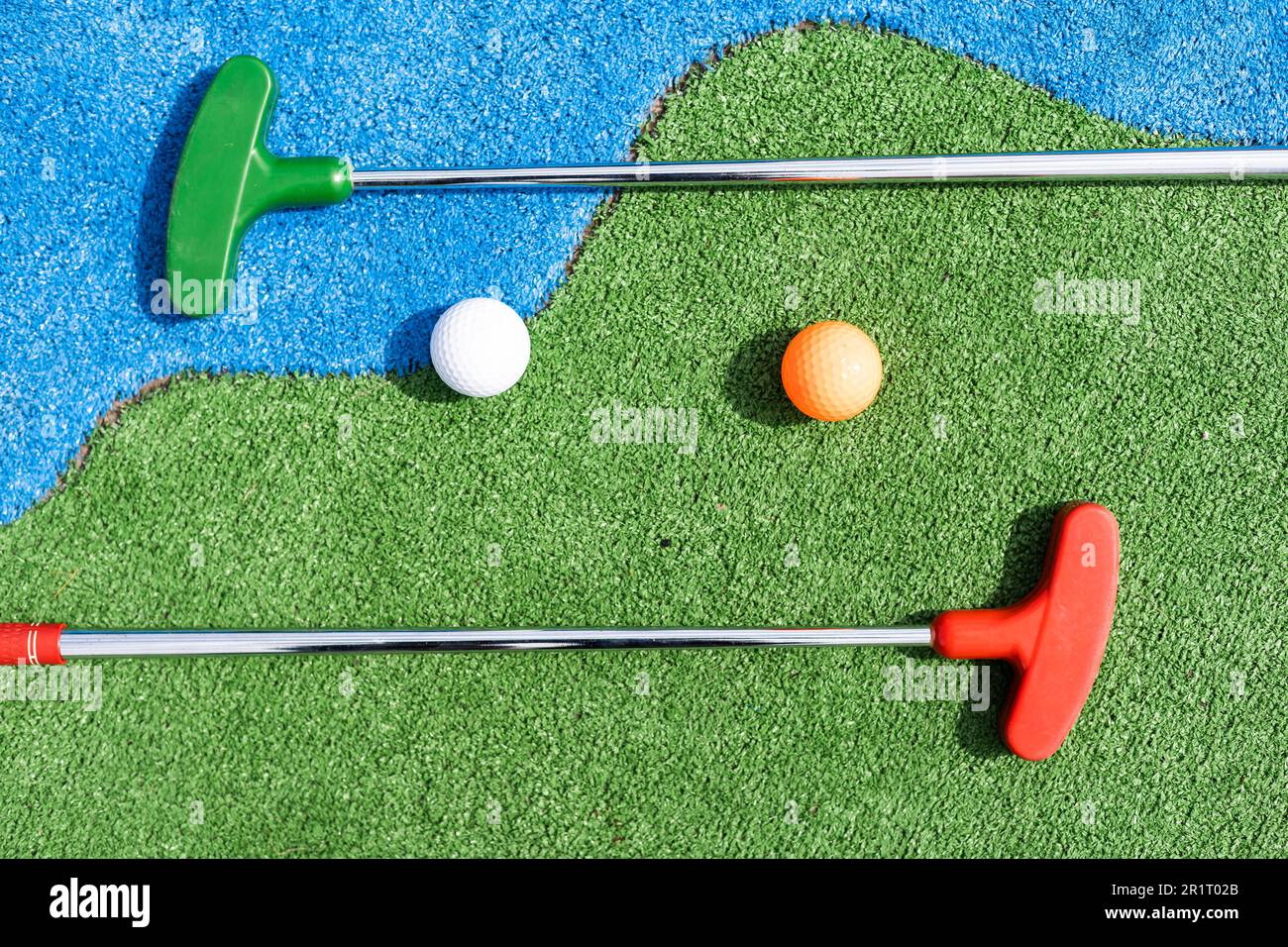 Mini-golf ball on artificial grass. Summer season game Stock Photo - Alamy