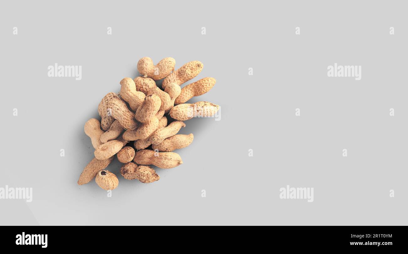 Close up photo of top view peanuts, raw peanuts in the nutshells ...