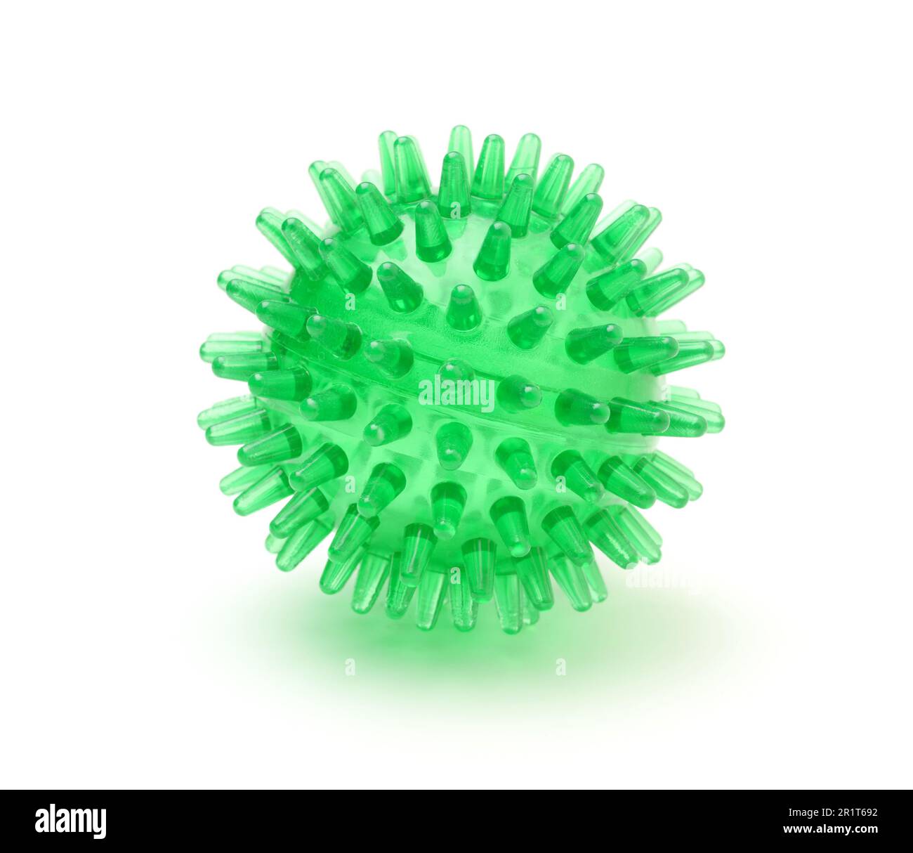 Small green sport massage ball isolated on white Stock Photo - Alamy