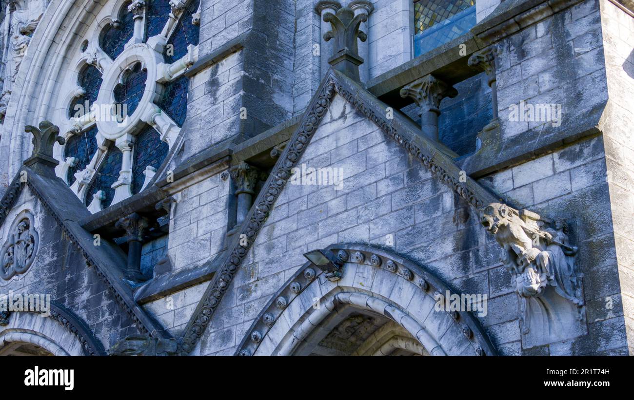 Fragment of the facade wall of Saint Fin Barre's Cathedral. Detail of ...