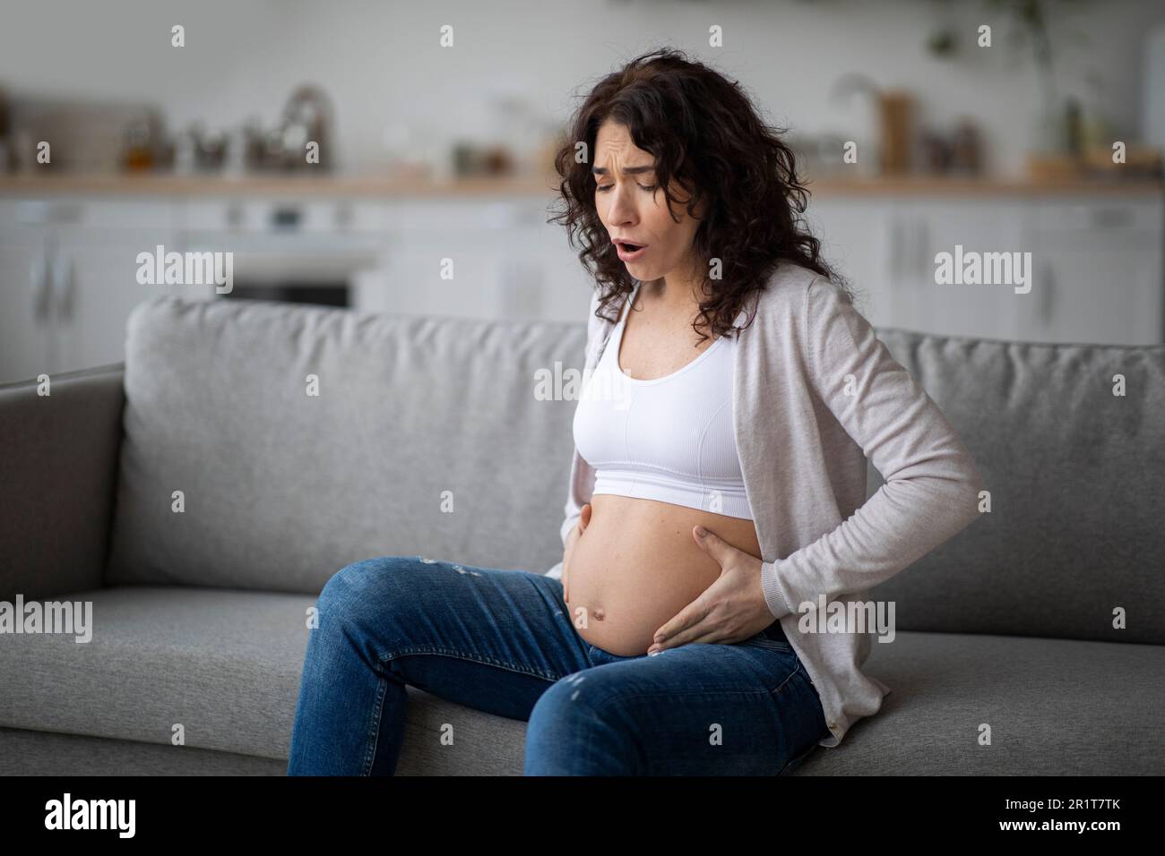 Braxton Hicks Contractions. Young Pregnant Woman Having Abdominal Pain ...