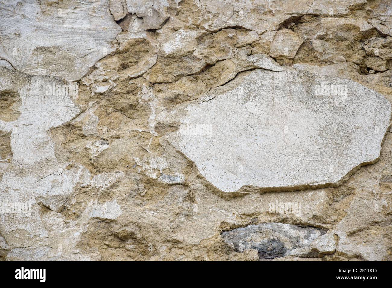 Texture of old stone wall with collapsed plaster. Background of shabby ...