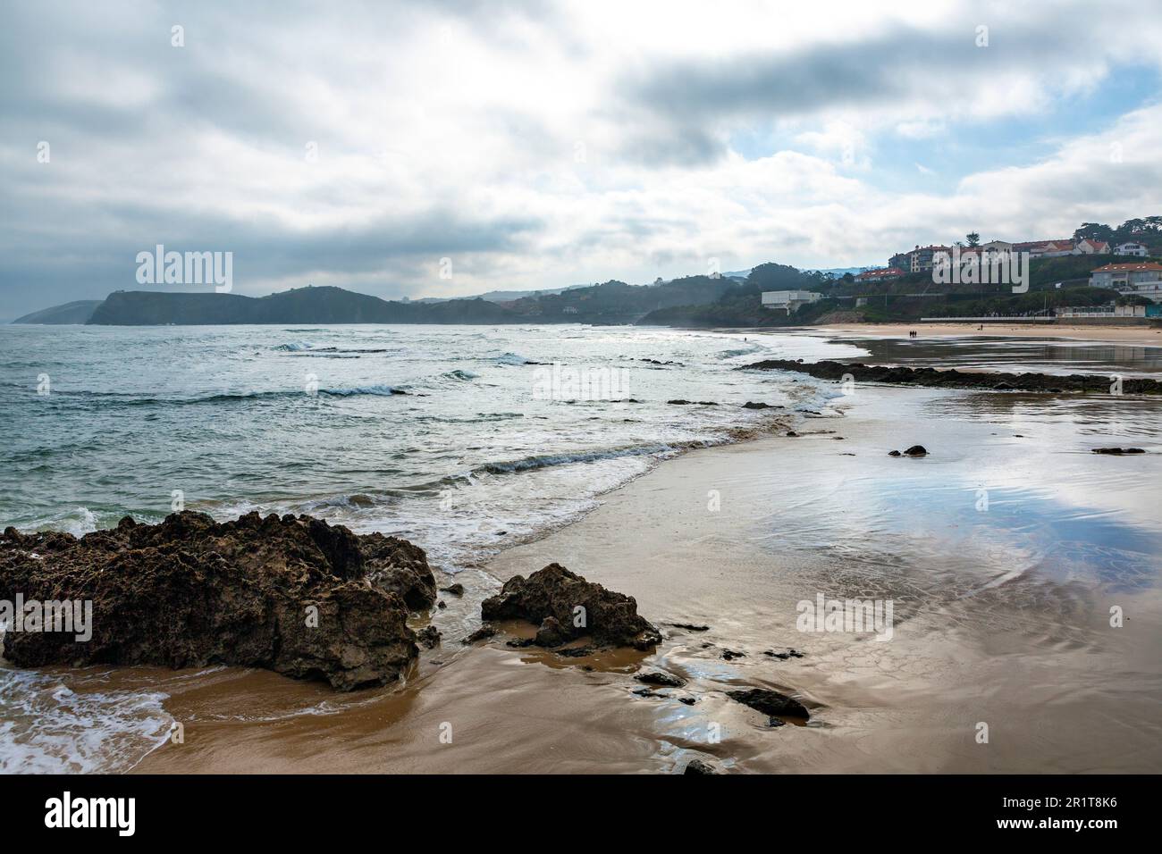beach in the spanish town of comillas, cantabria Stock Photo - Alamy