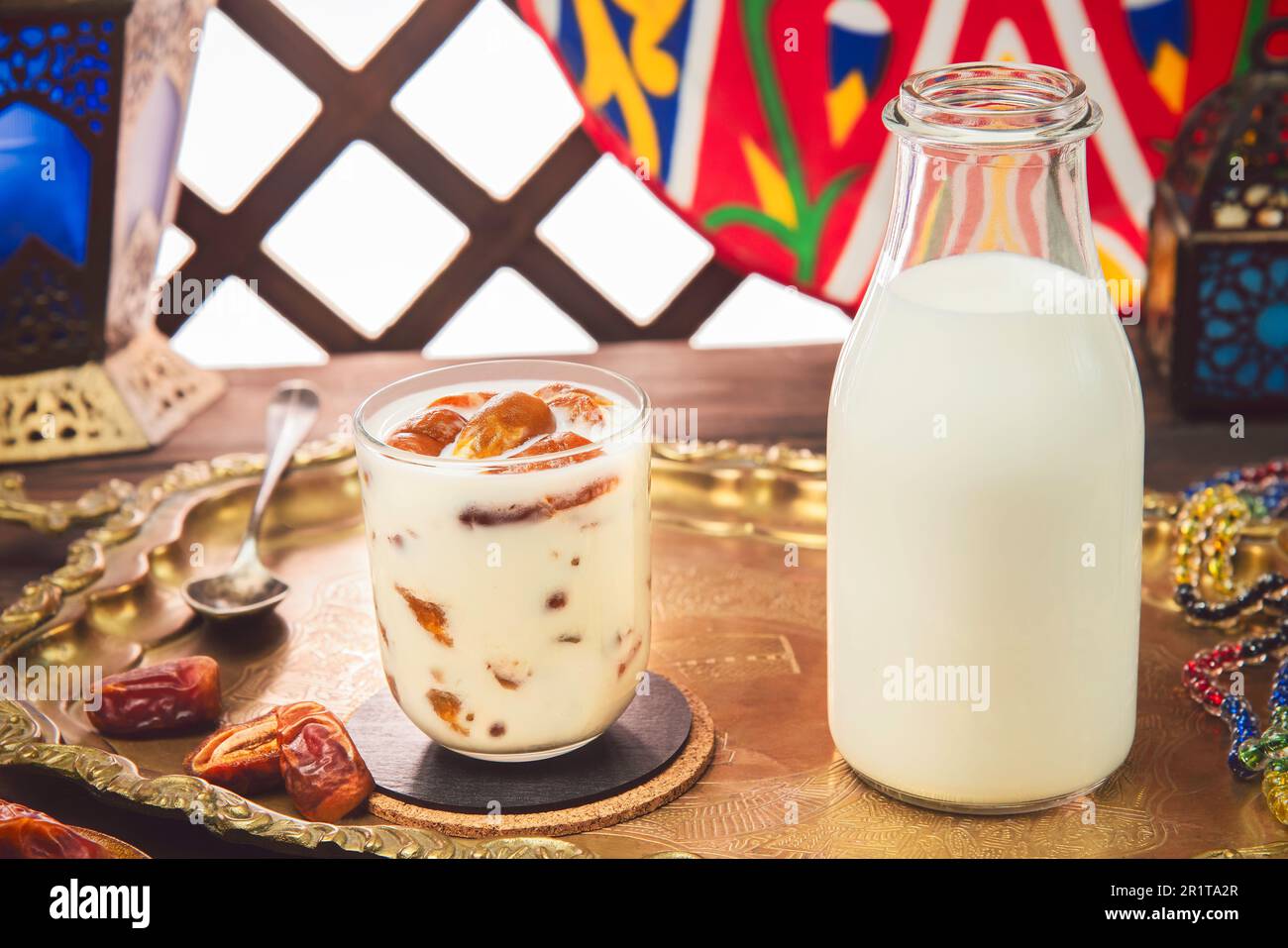 Middle Eastern delicious drink made by soaking dates in creamy vanilla ...