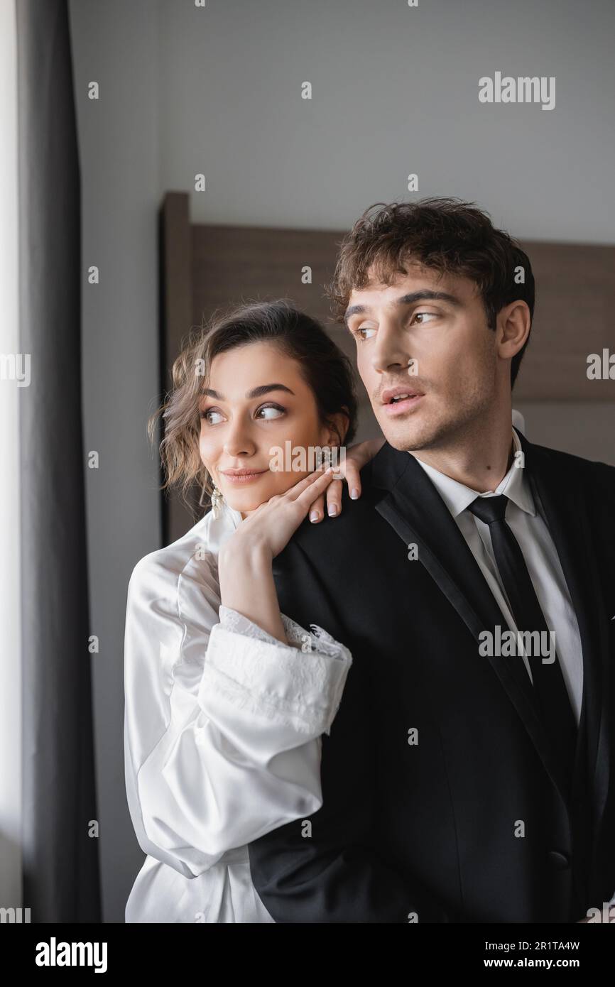 Bride leaning on shoulder hi-res stock photography and images - Alamy