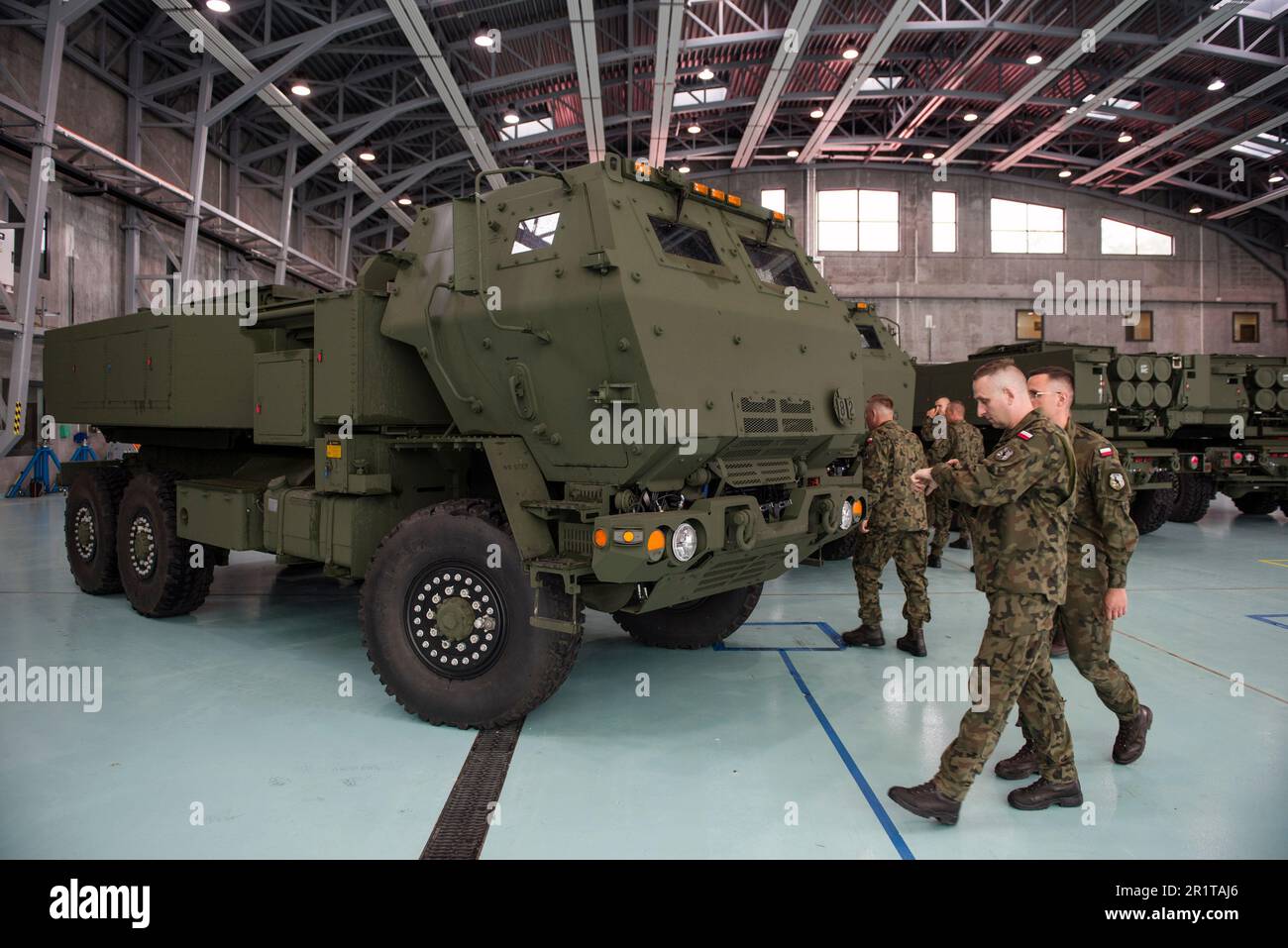 Himars rocket launchers placed on military vehicles and polish soldiers ...