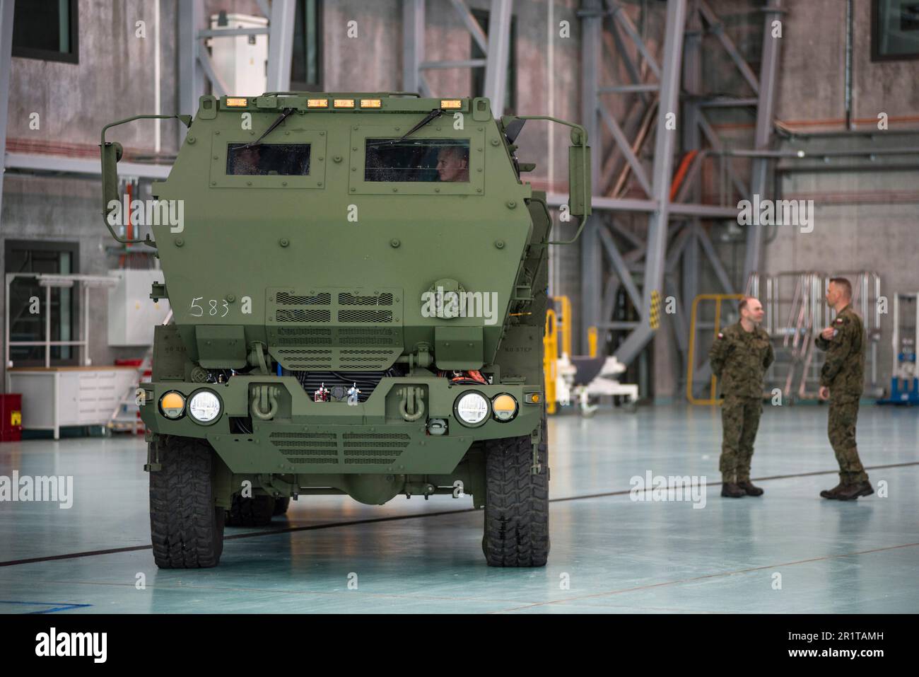 Himars rocket launchers placed on military vehicles and polish soldiers ...