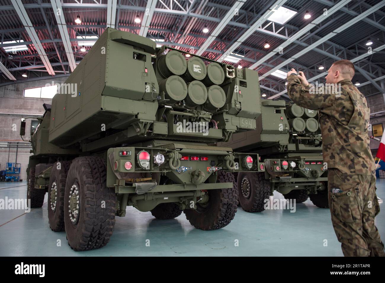 Himars rocket launchers placed on military vehicles and polish soldiers ...