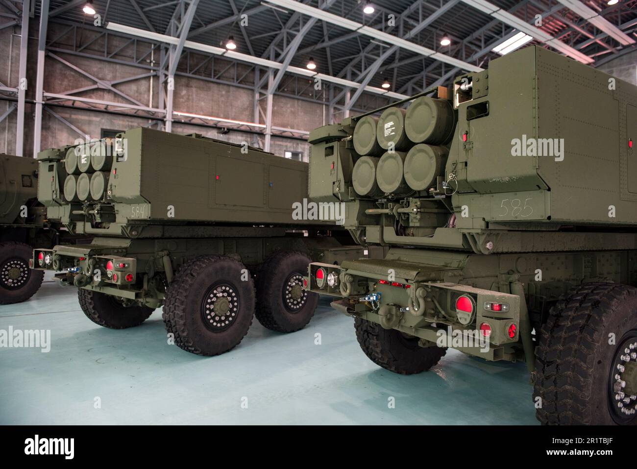 Himars rocket launchers placed on military vehicles and polish soldiers ...