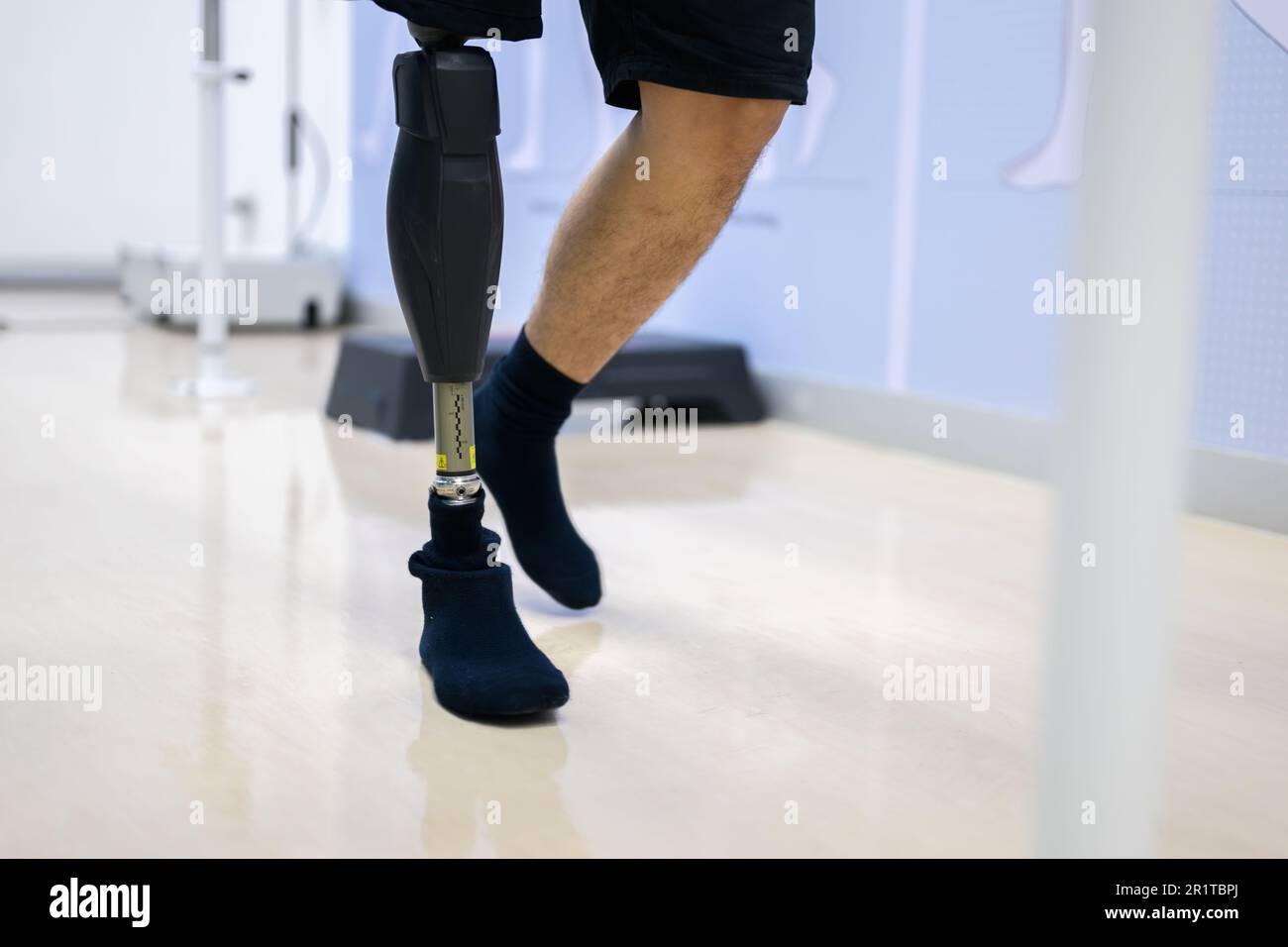 Disabled athlete patient with physical disability doing exercise Stock ...