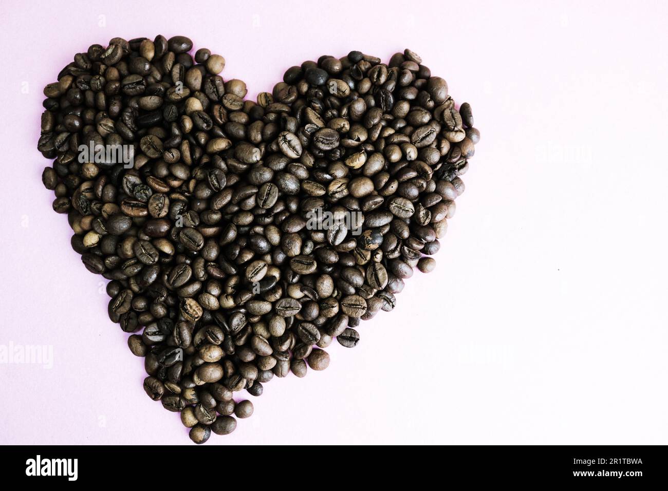 Beautiful texture in the shape of a heart from freshly roasted selected ...