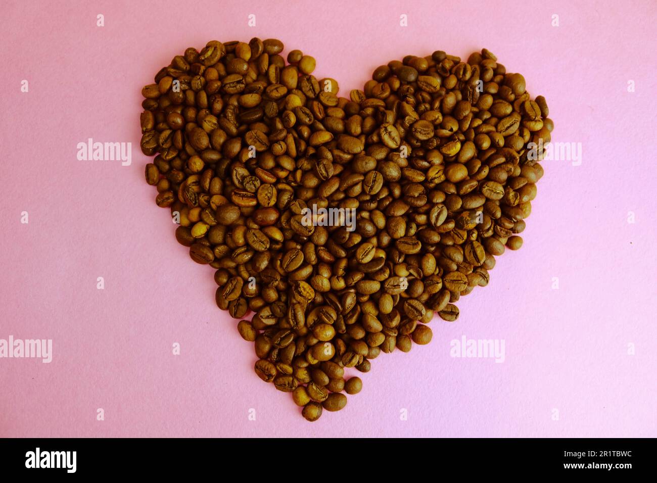 Beautiful texture in the shape of a heart from freshly roasted selected ...
