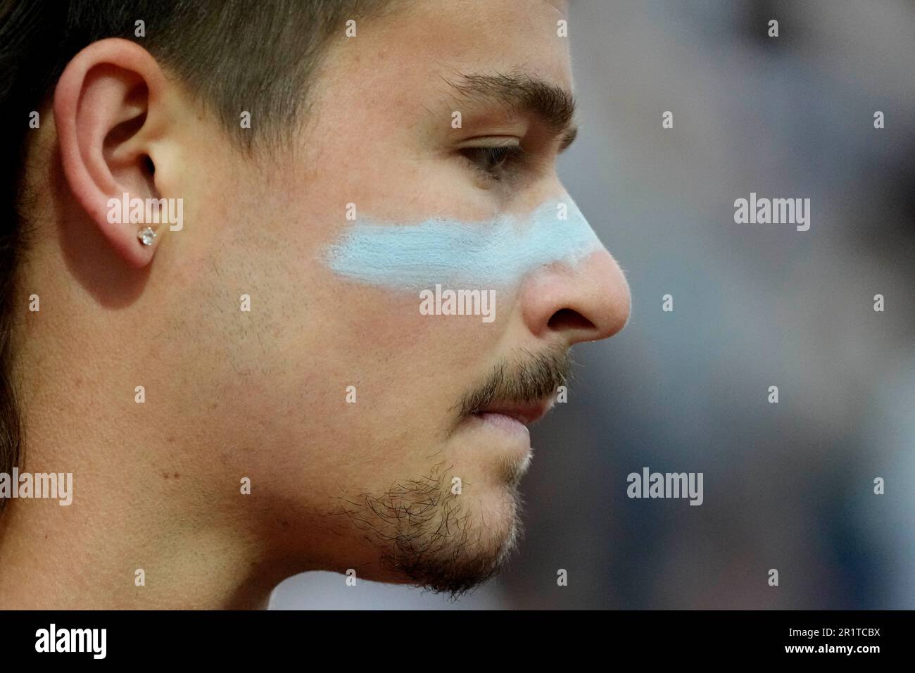 J.J. Wolf, of the United States, prepares to serve the ball to ...
