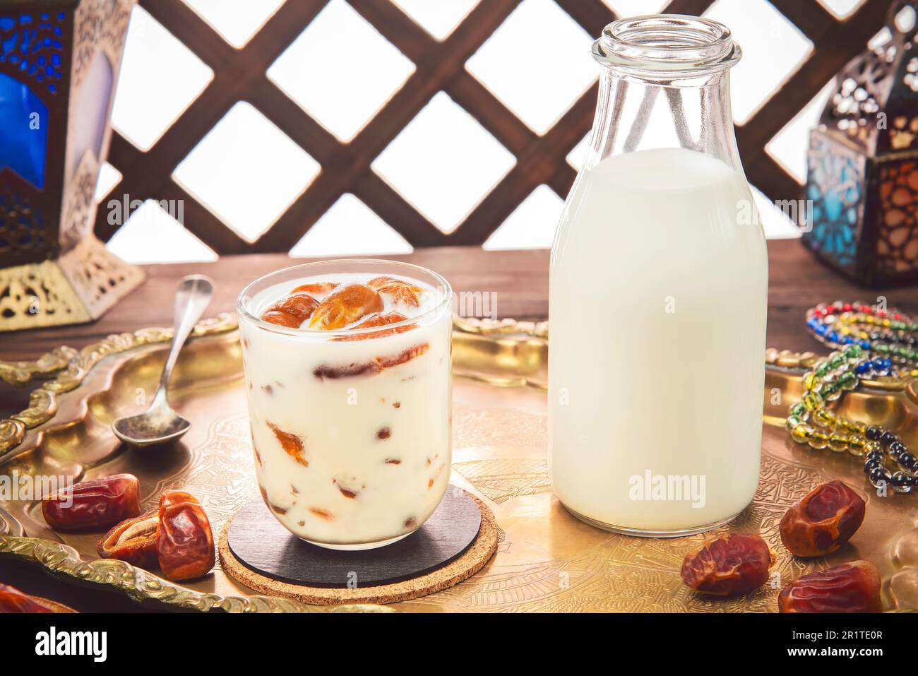 Middle Eastern delicious drink made by soaking dates in creamy vanilla ...