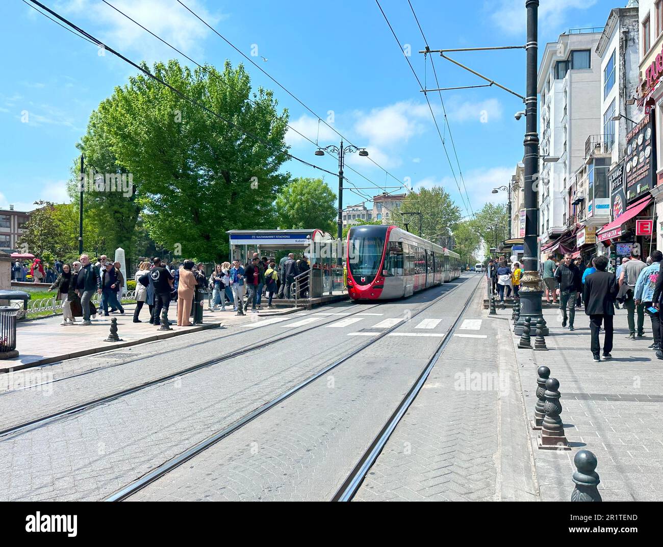 Public transportation tram passing near the Hagia Sophia mosque with ...
