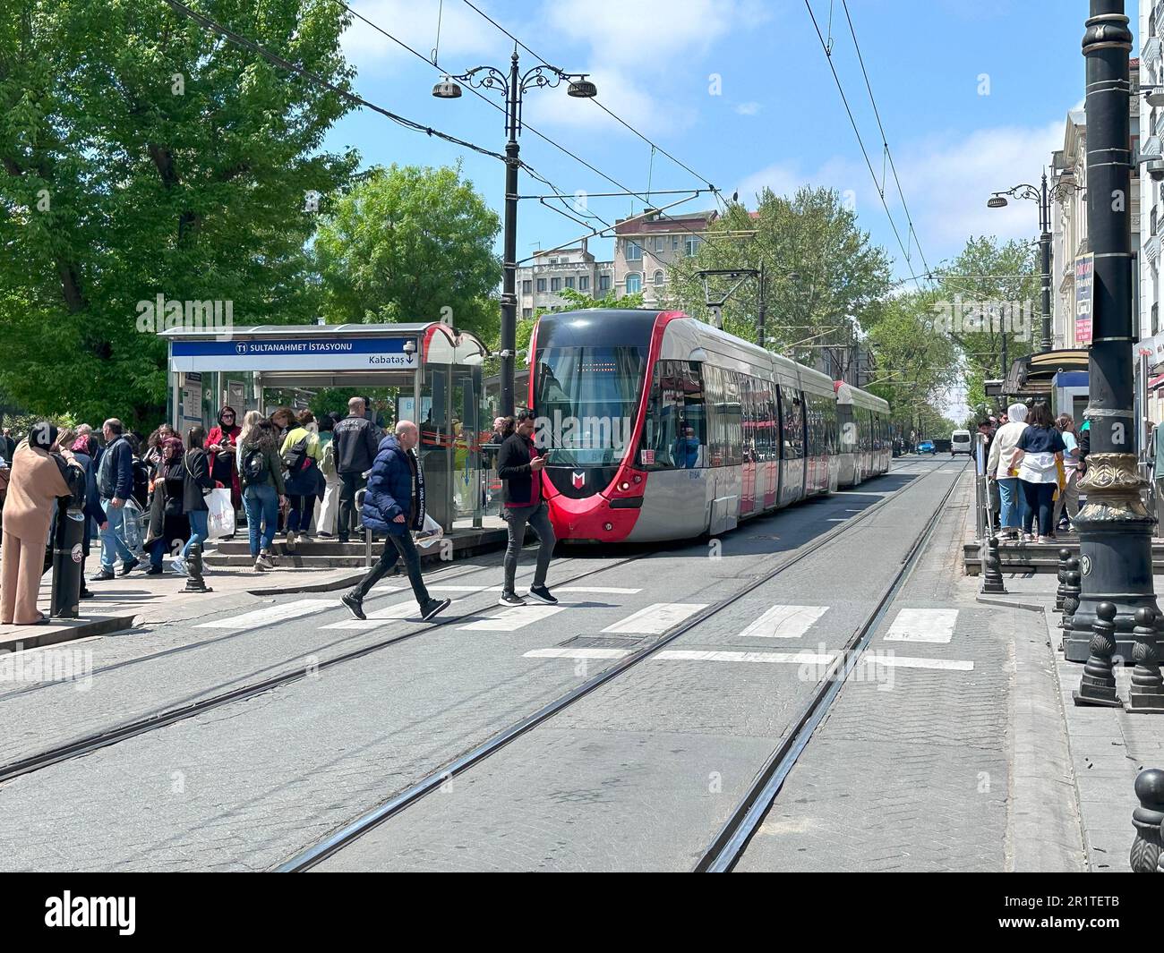 Public transportation tram passing near the Hagia Sophia mosque with ...