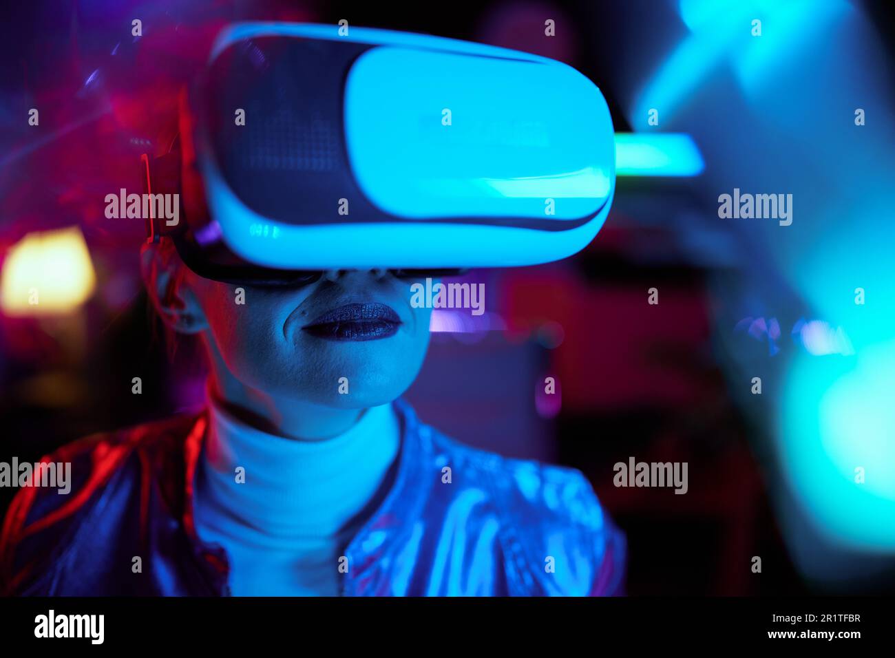 Neon metaverse futuristic concept. Portrait of modern female in vr ...