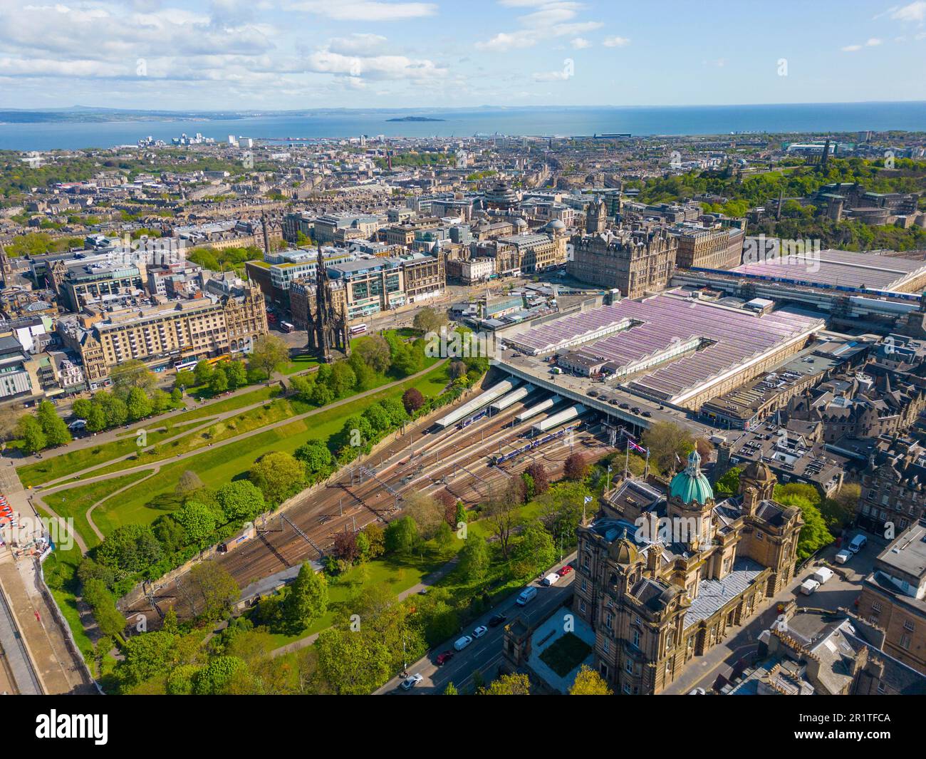 Aerial view from drone of Waverley railway station and Edinburgh city ...