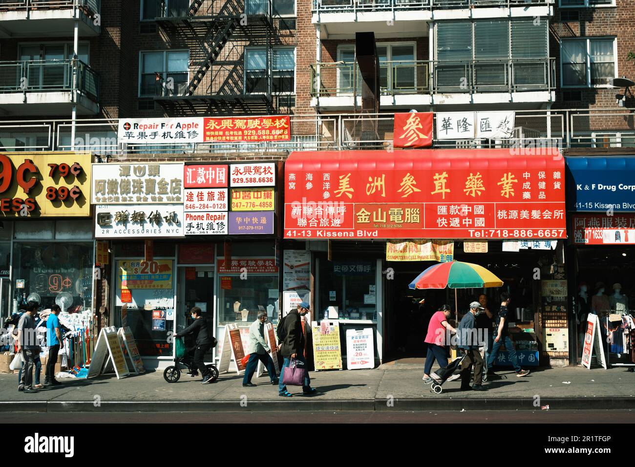 Street scene with vibrant signs, Flushing, Queens, New York Stock Photo ...